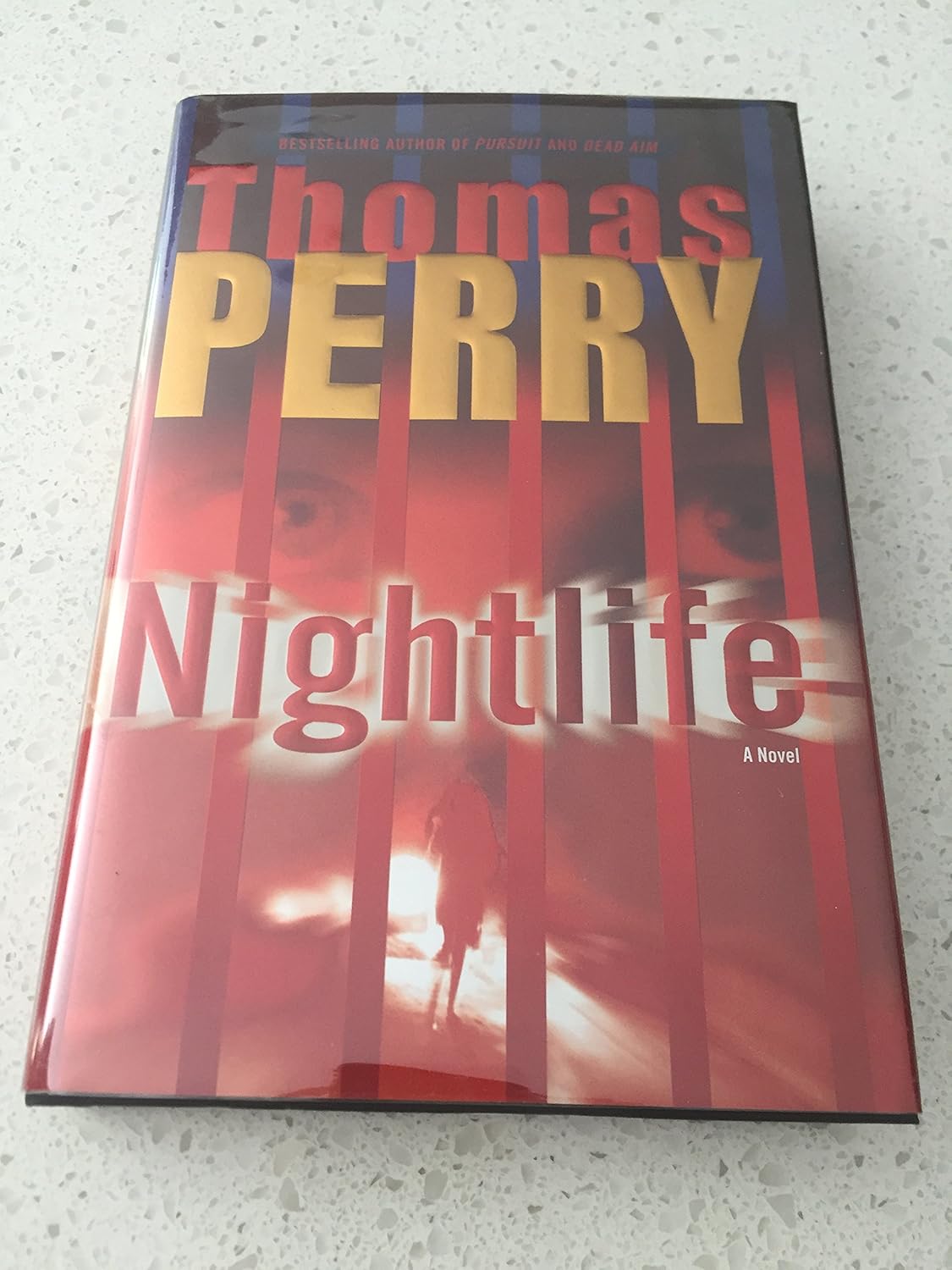Amazon.com: Nightlife: A Novel: 9781400060047: Perry, Thomas: Books