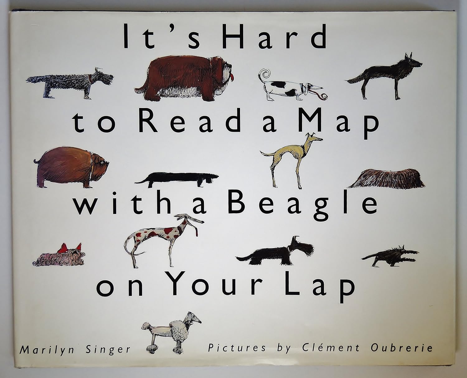 It's Hard to Read a Map With a Beagle on Your Lap: Singer, Marilyn ...