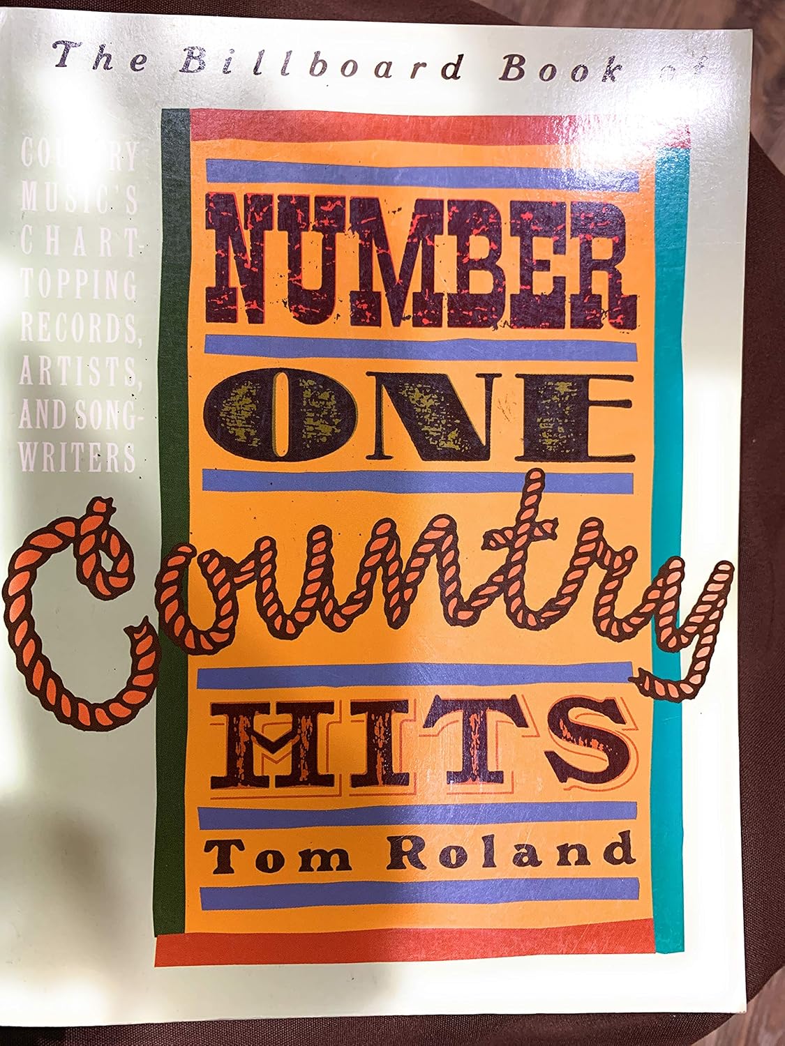 Amazon | The Billboard Book of Number One Country Hits | Roland, Tom ...