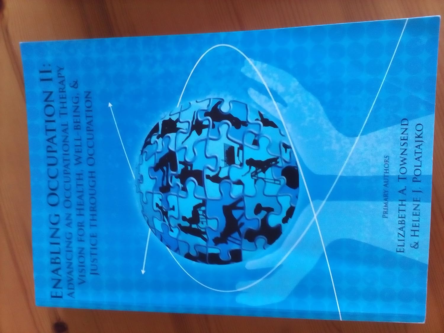 Amazon.co.jp: Enabling Occupation II: Advancing an Occupational Therapy ...