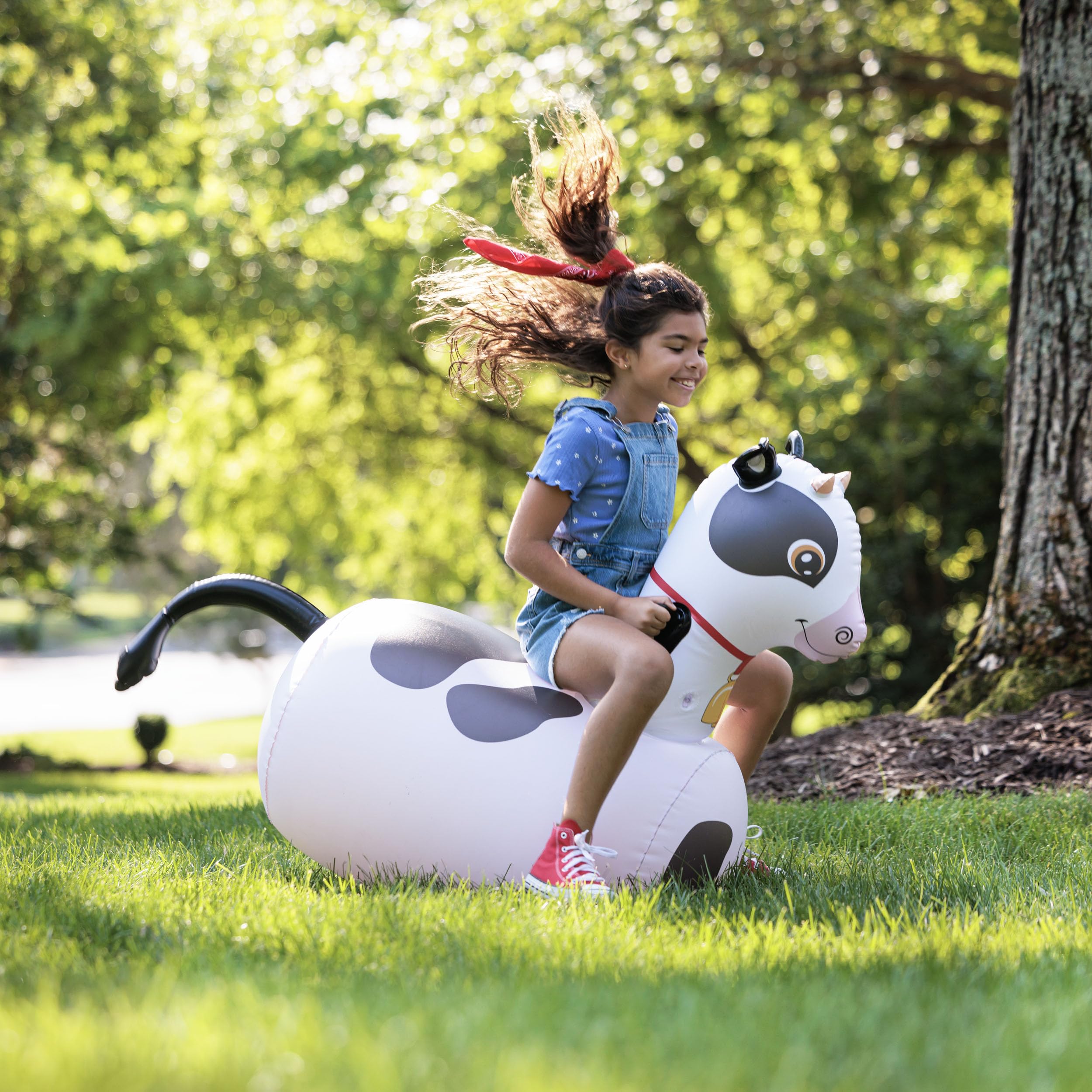 Snapklik.com : Hearthsong Hop N Go Inflatable Bouncy Cow Riding
