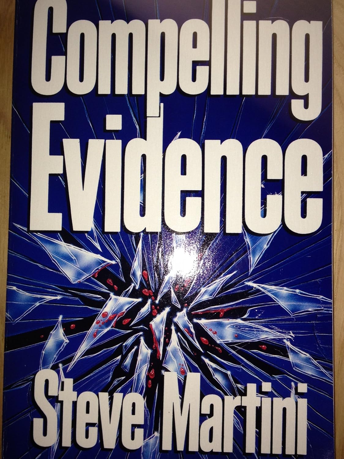 Compelling Evidence: Martini, Steve: 9780747239895: Amazon.com: Books
