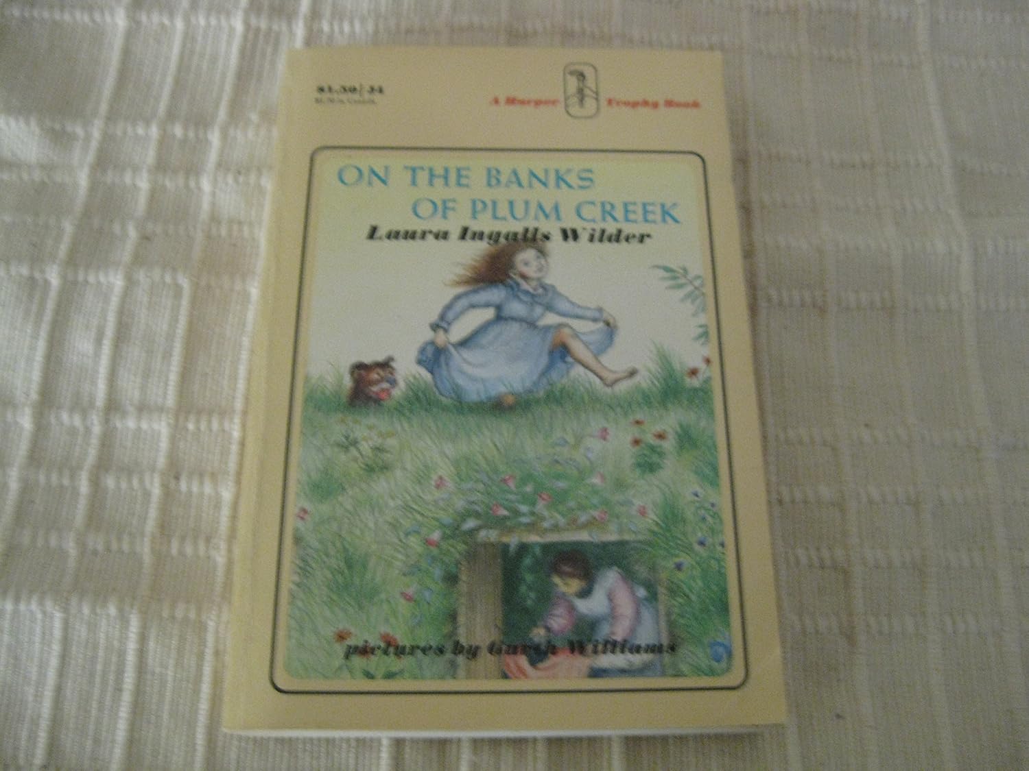 On the Banks of Plum Creek: Laura Ingalls Wilder: Amazon.com: Books