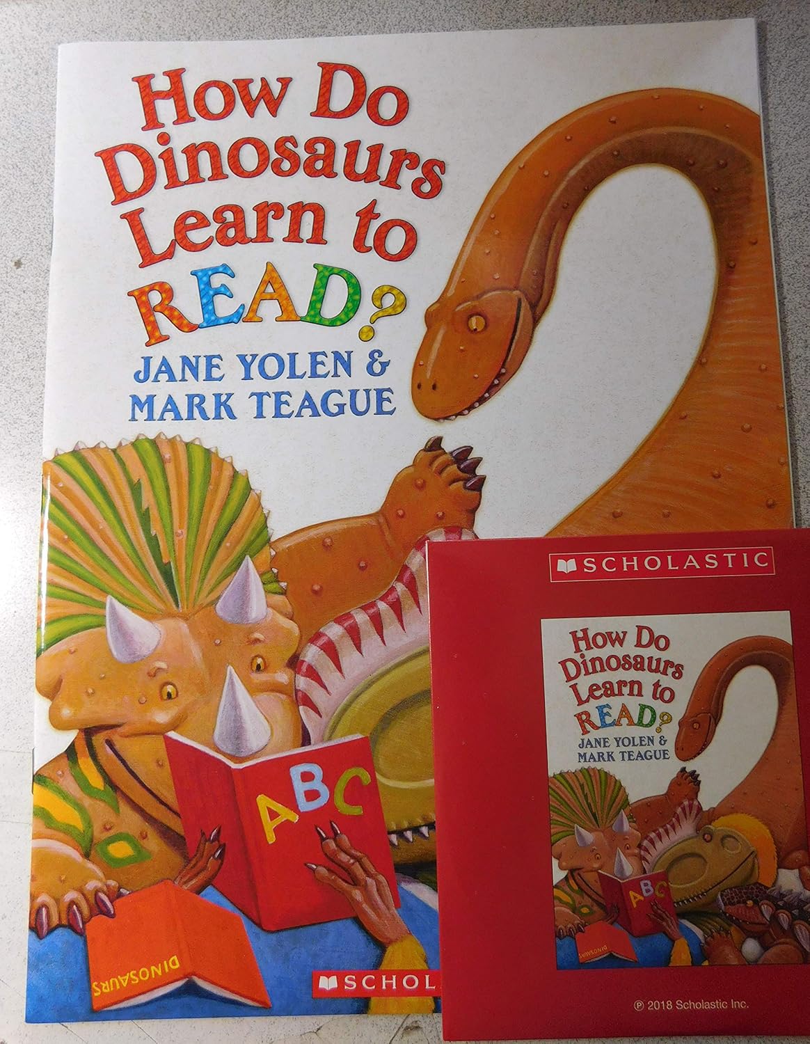 Amazon.com: How Do Dinosaurs Learn to Read? with read along CD: Jane ...