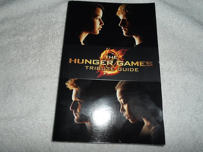 Amazon.com: The Hunger Games Tribute Guide: 8601404414329: Seife, Emily ...