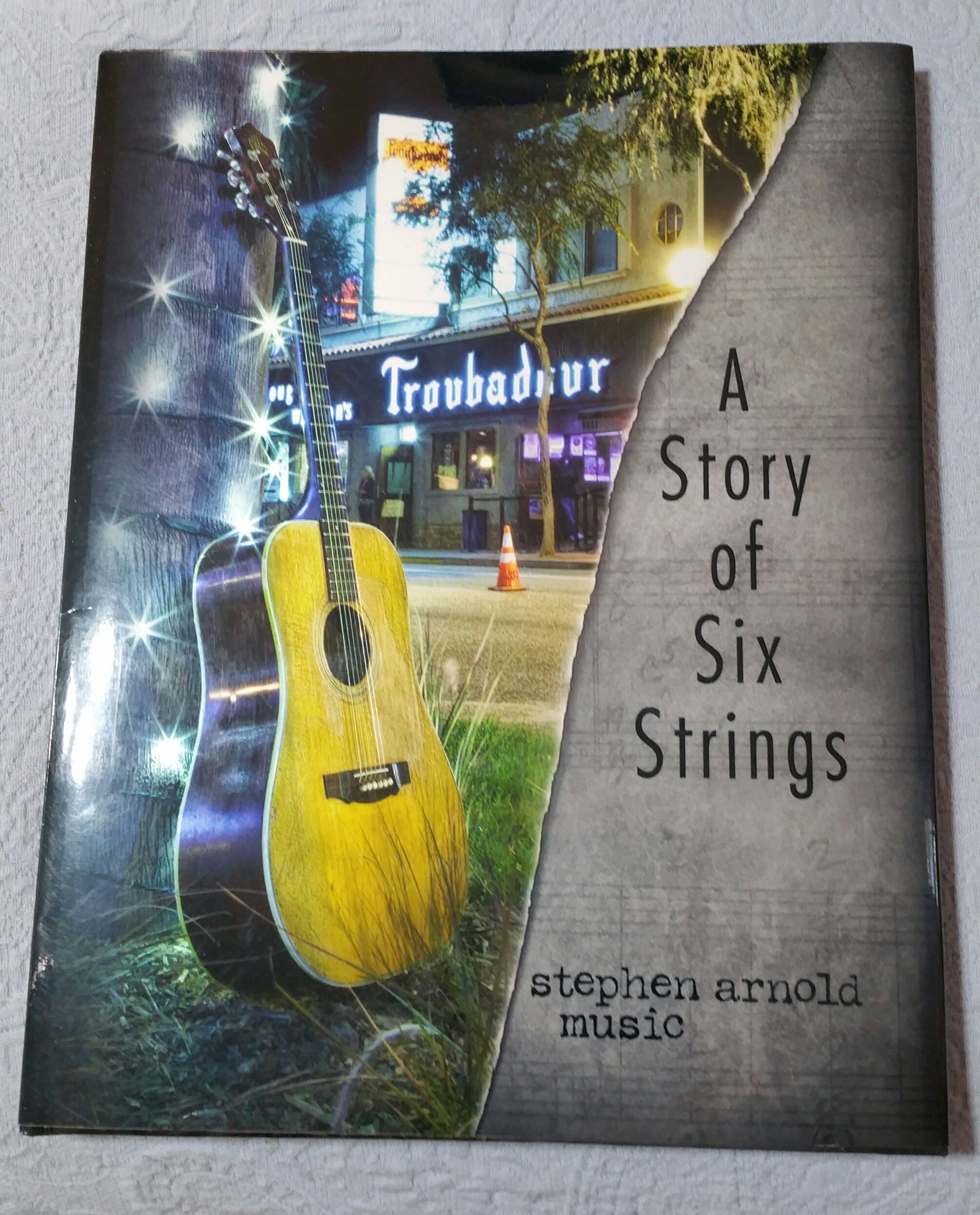 A Story of Six Strings: Stephen Arnold: 9781612547954: Amazon.com: Books
