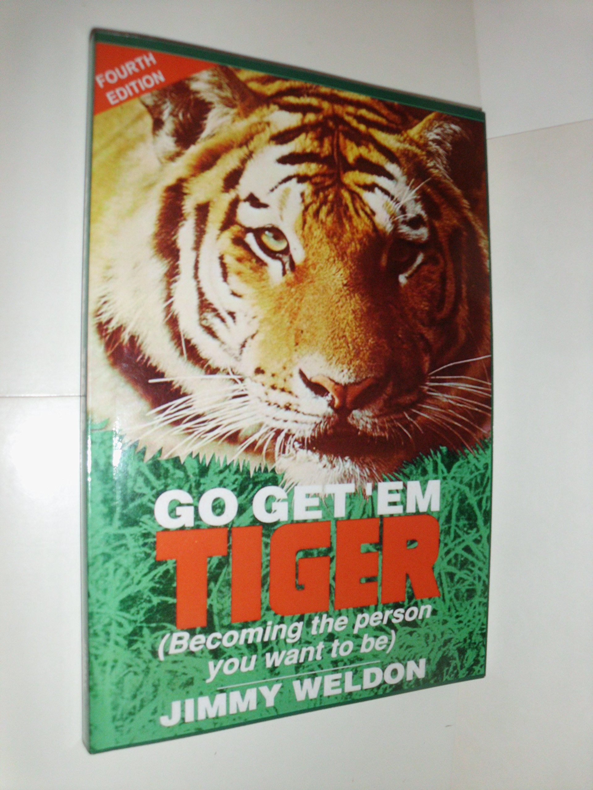 Go Get 'Em Tiger: Weldon, Jimmy: 9781449514631: Amazon.com: Books