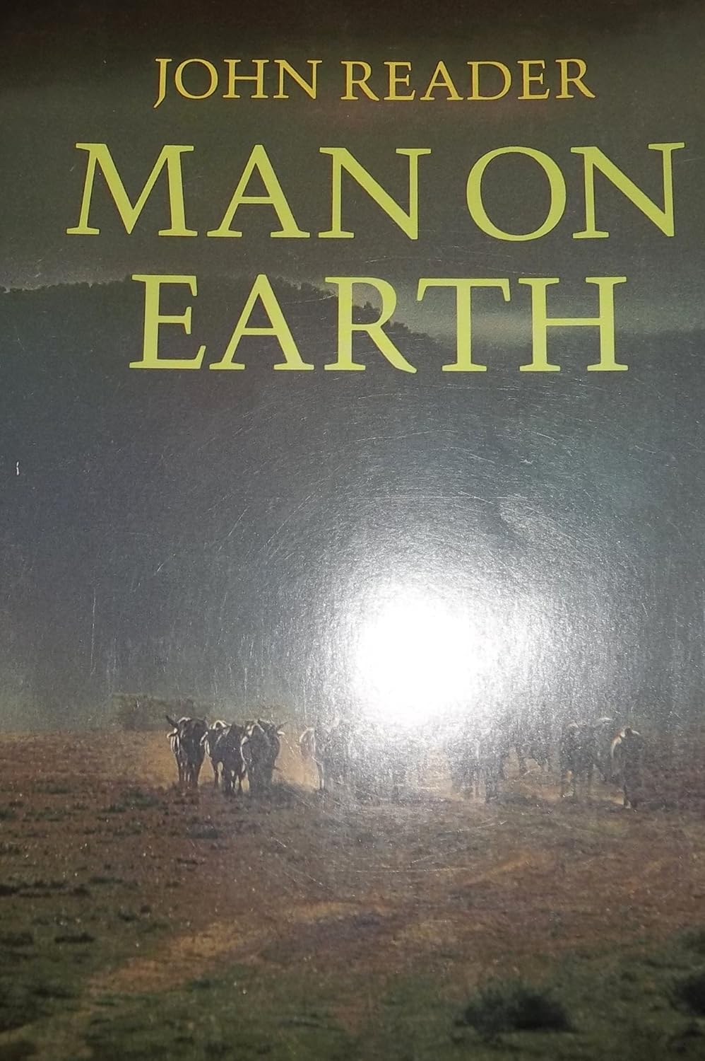 Man on Earth: Reader, John: Amazon.com: Books