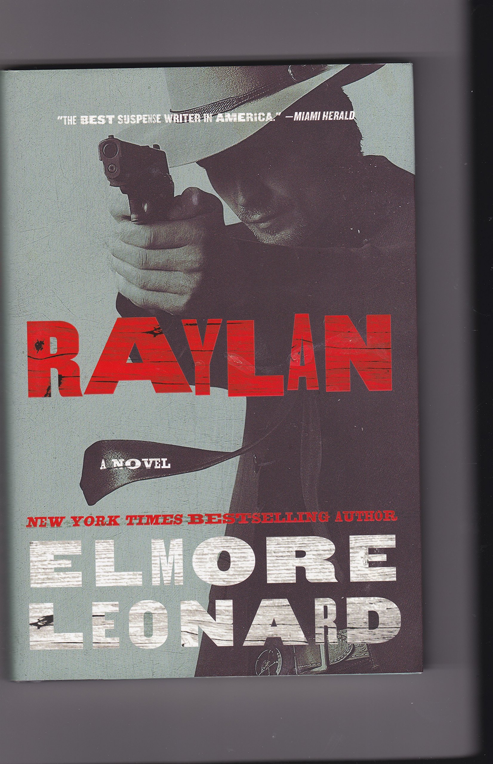 Amazon.com: Raylan: A Novel: 9780062119469: Leonard, Elmore: Books
