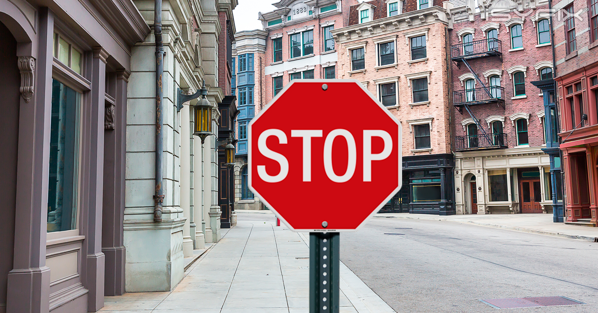 Sto Sign Stop Sign Against Building Exterior In New York City, USA