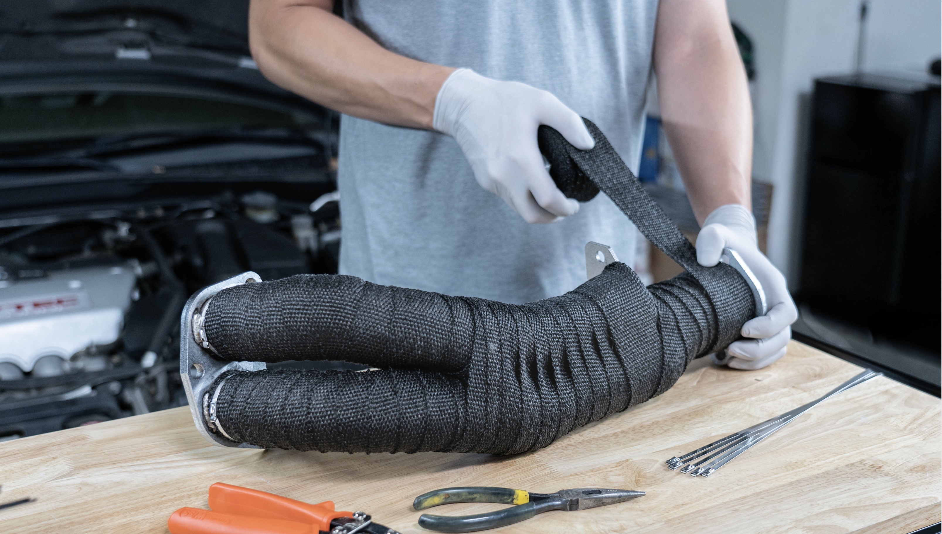 Watch How to wrap exhaust wrap and seal with black silicone spray on ...